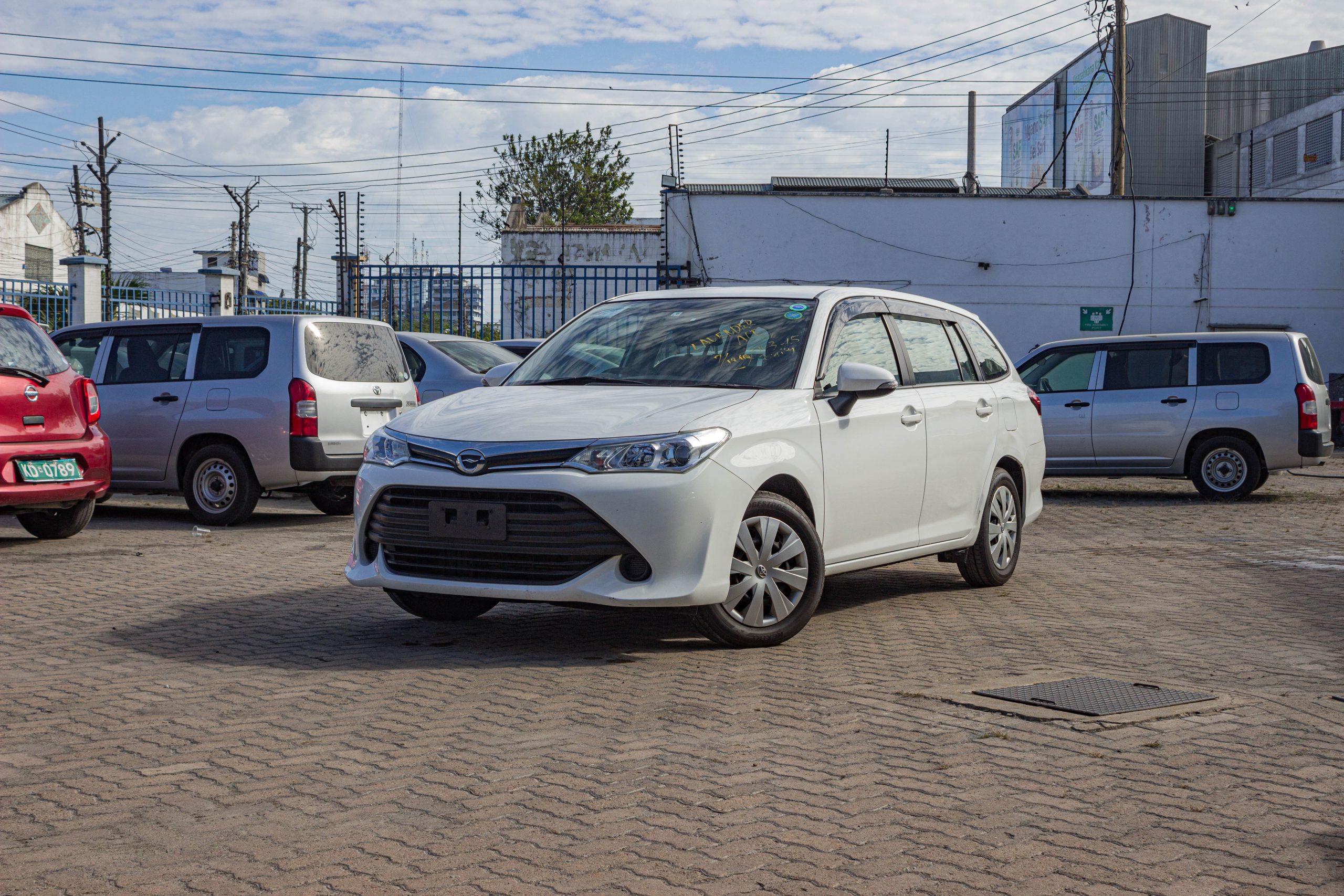 Toyota Corolla Fielder 2018 White – Sammy Traders Ltd